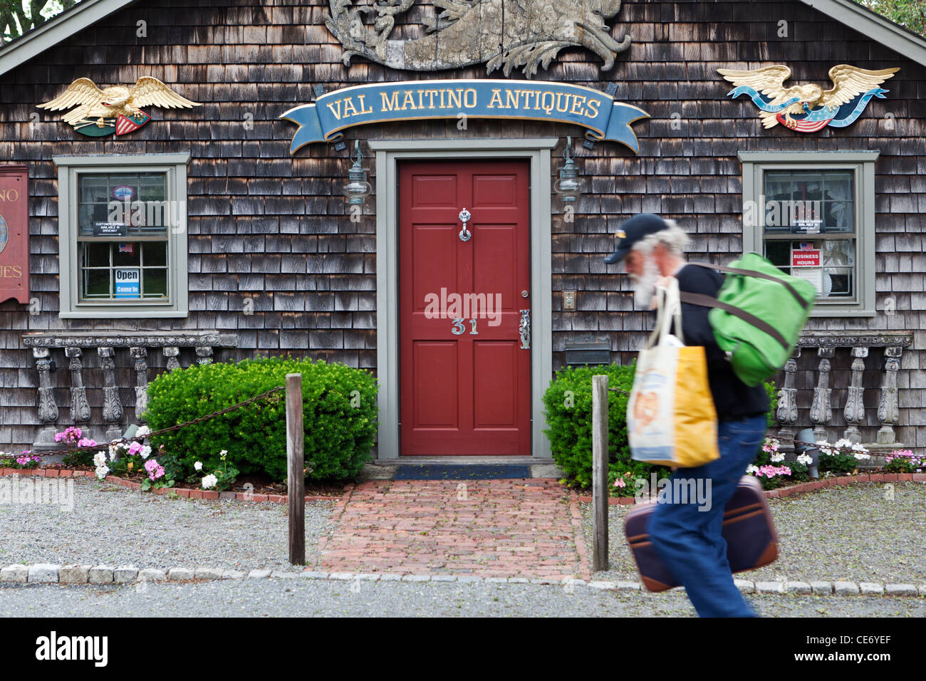 Sailor walking by an Antique shop Nantucket Town Nantucket Cape Cod ...