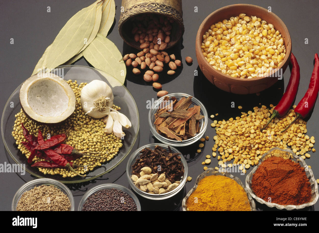 Indian spices red dried chilly garlic cloves cardamom corn pulses ...