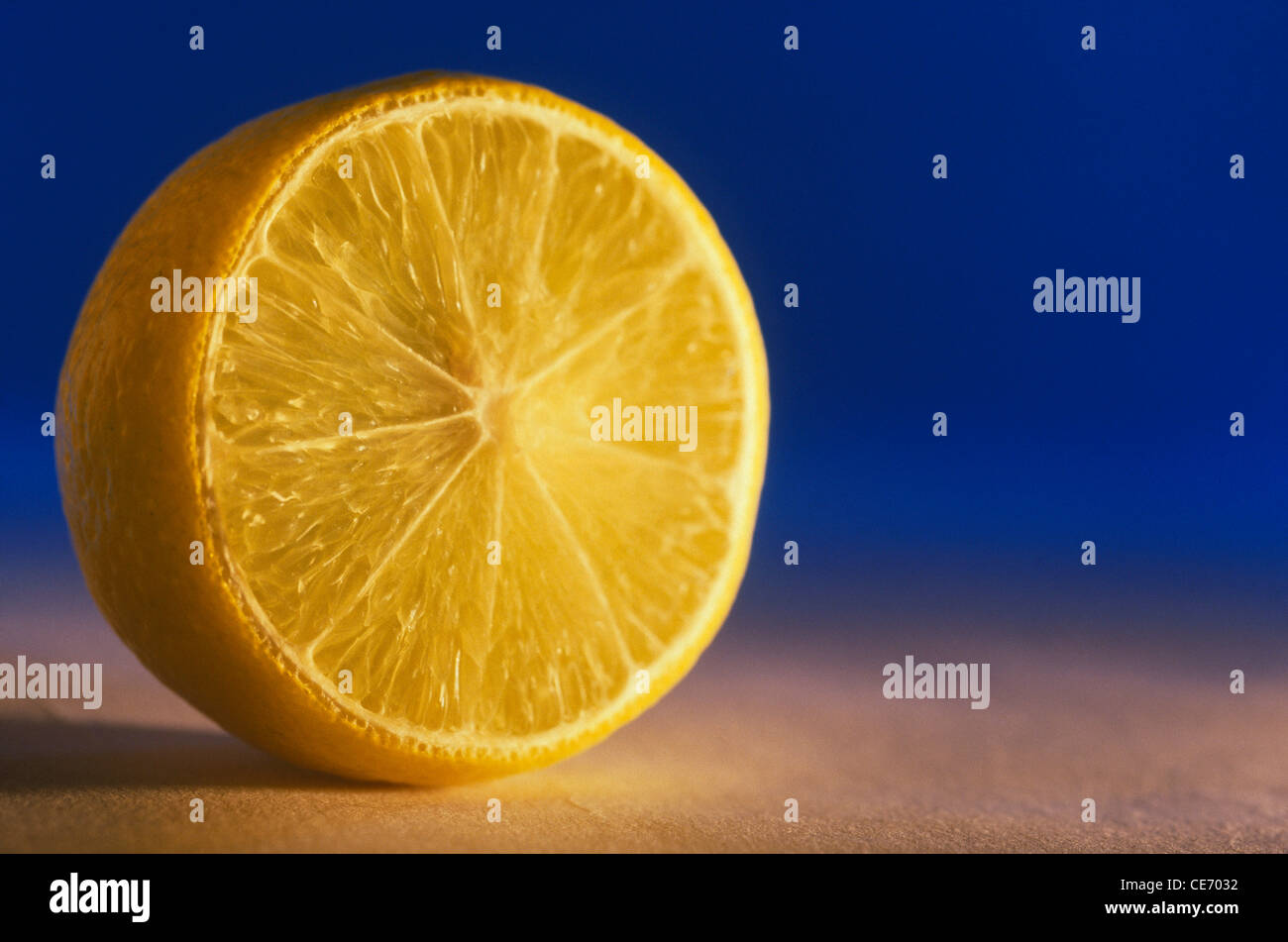 Lemon cut in half Stock Photo - Alamy