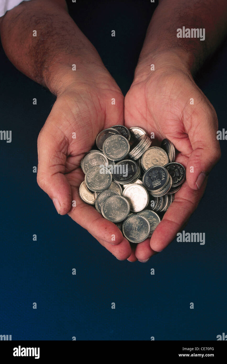 STP 83927 : concept coins savings bribe corruption money hands india ...