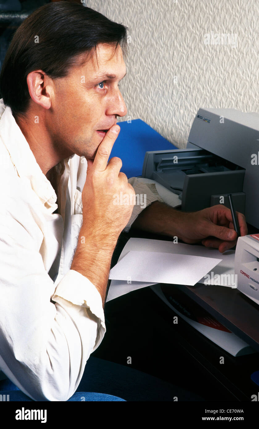contemplative man writing a letter Stock Photo - Alamy