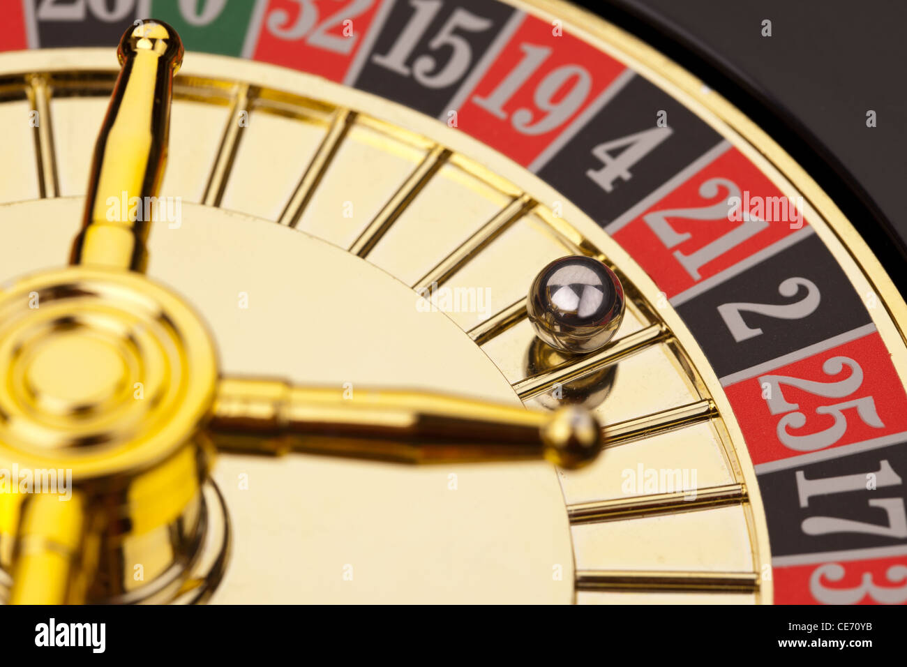 Beautiful gold roulette on a black background Stock Photo - Alamy