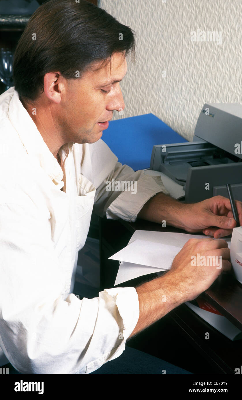 Contemplative man writing letter hi-res stock photography and images ...