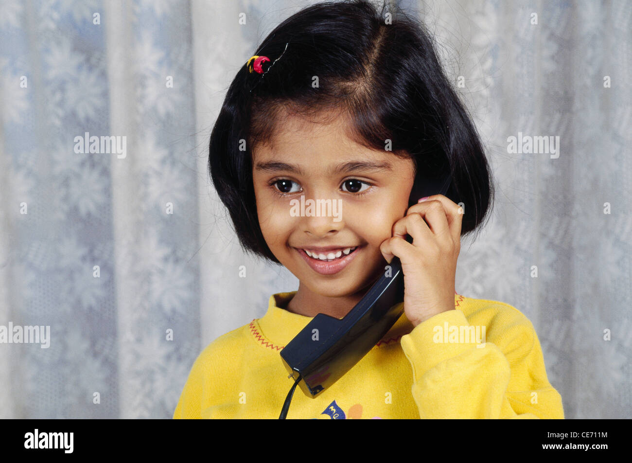 Indian girl child talking on telephone ; India ; Asia ; MR#322 Stock ...