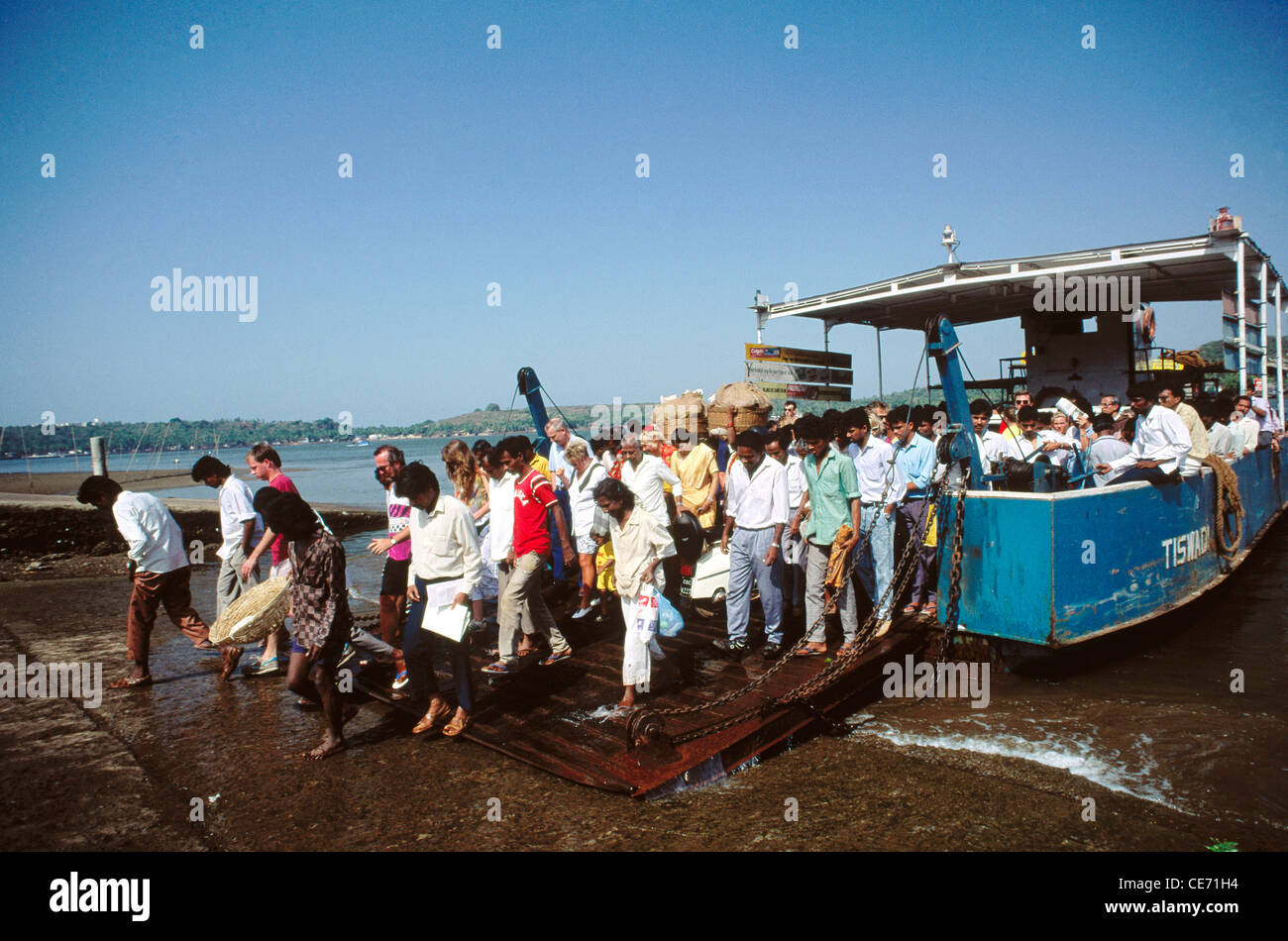 MAA 82488 : people getting out of ferry boat ; goa ; india Stock Photo ...