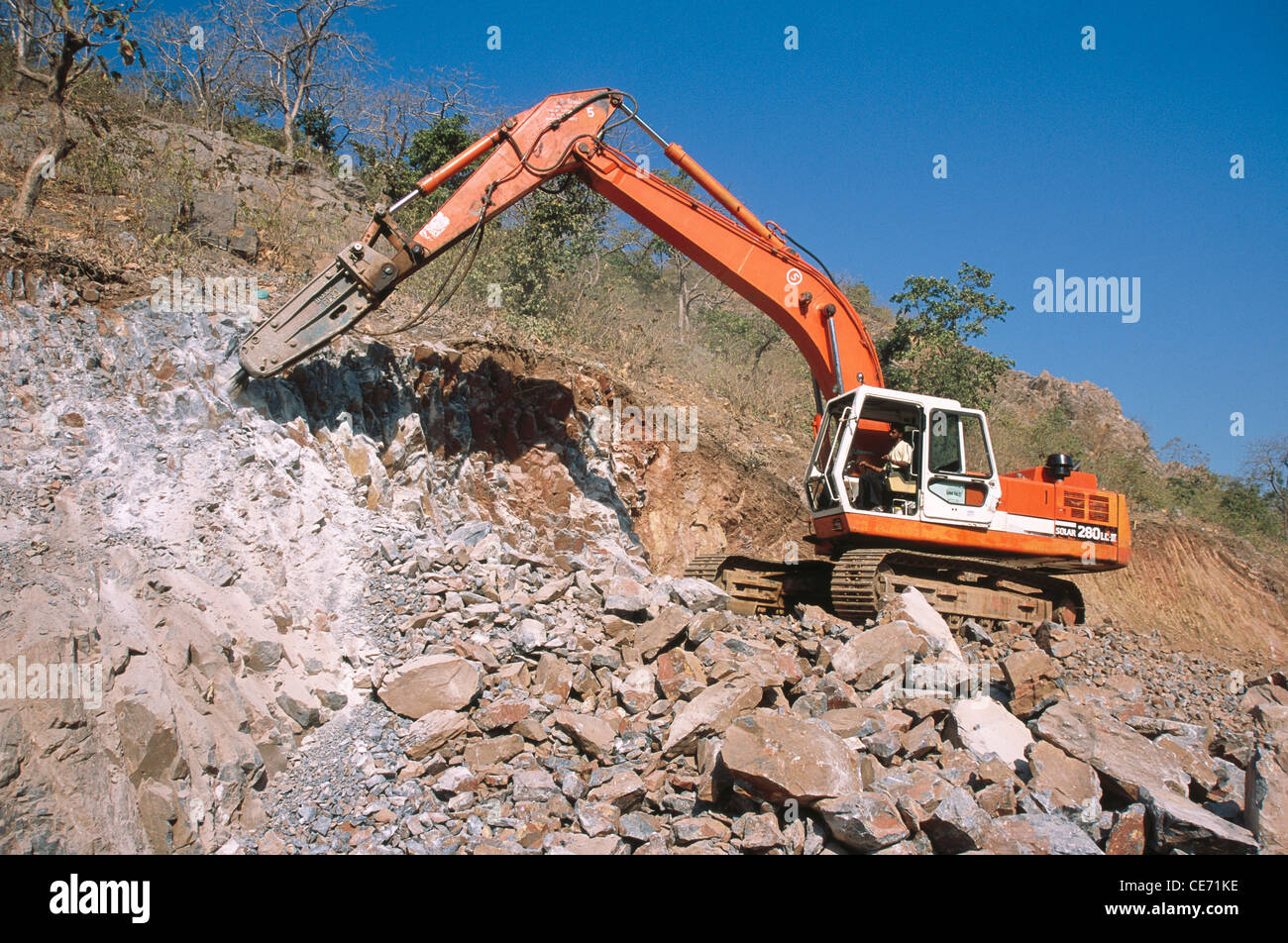 Excavator machine working ; heavy construction equipment ; digging for ...