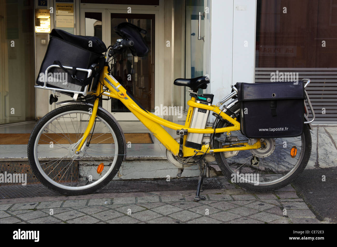 Stock photo of a french postal workers electric bicycle Stock Photo - Alamy