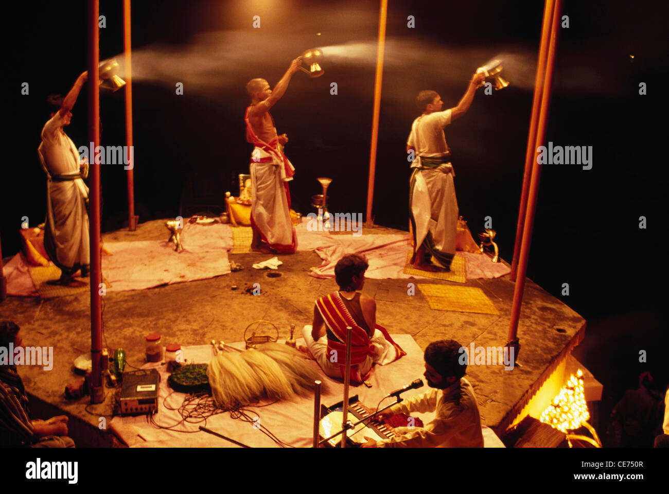 RSA 82903 : indian priest praying to river Ganges varanasi uttar ...
