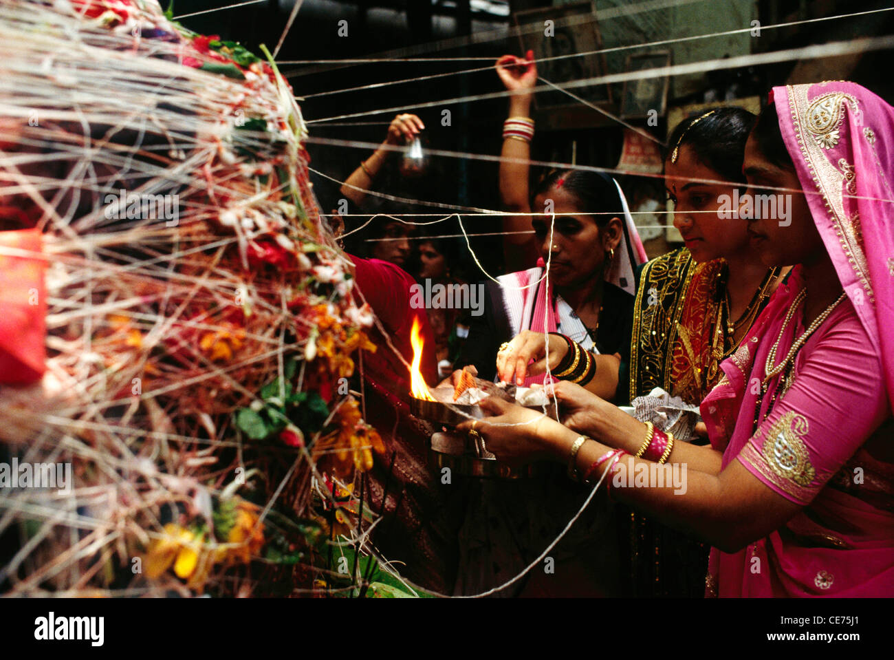 Indian woman praying tree hi-res stock photography and images - Alamy