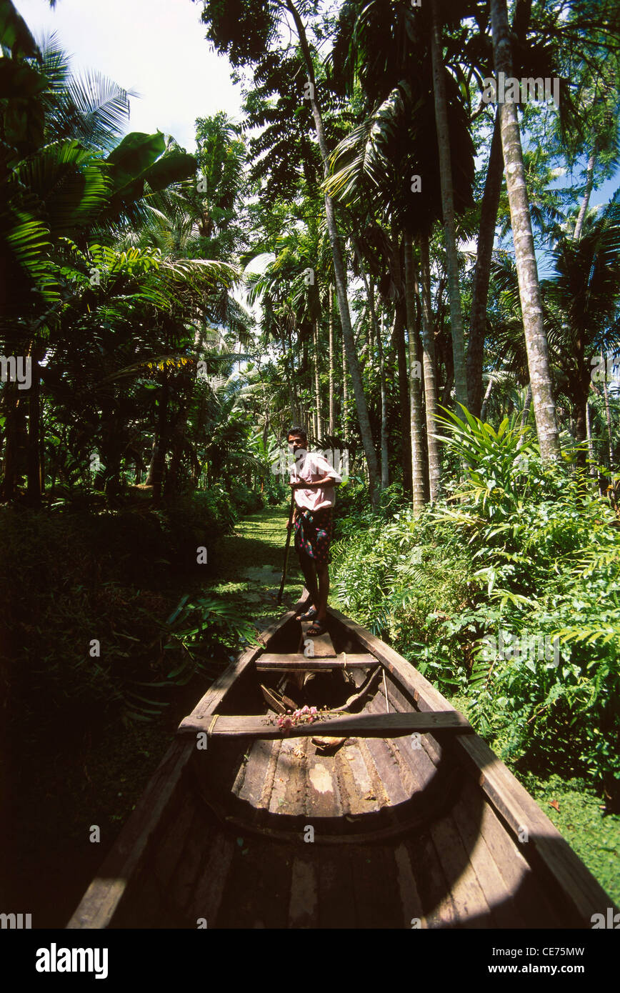 HMA 82374 : indian man rowing boat in backwaters cochin kochi kerala ...