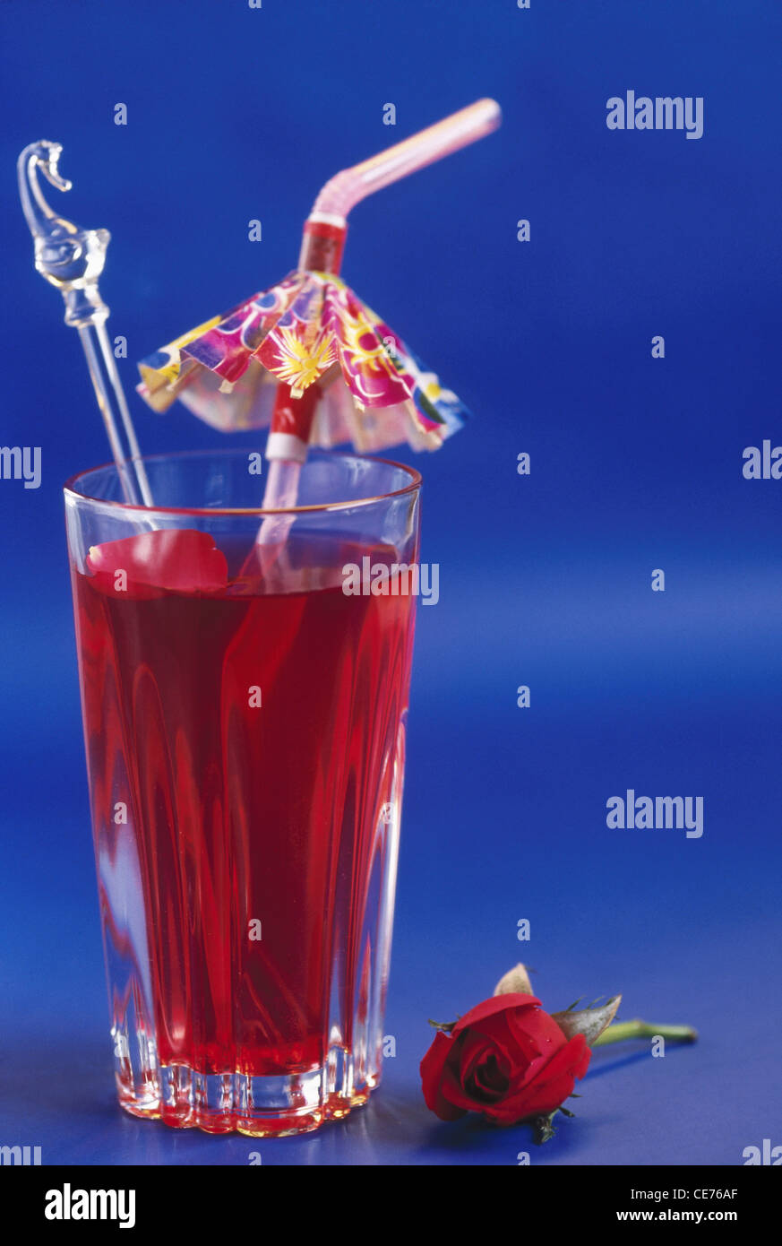 VHM 84796 : Drinks ; Rose Sarbat in glass decorated with straw and red ...