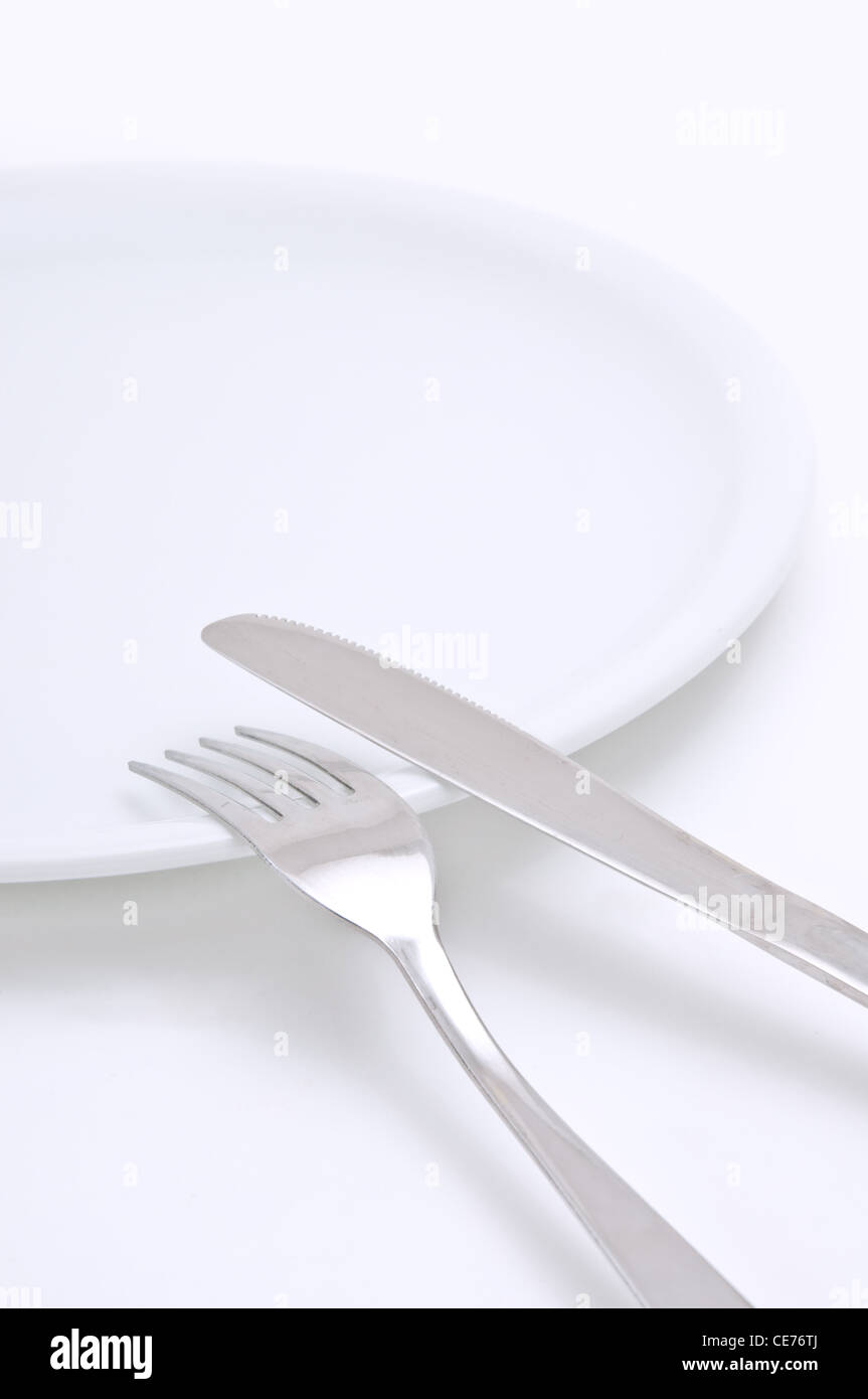 Empty plate restaurant table Cut Out Stock Images & Pictures - Alamy