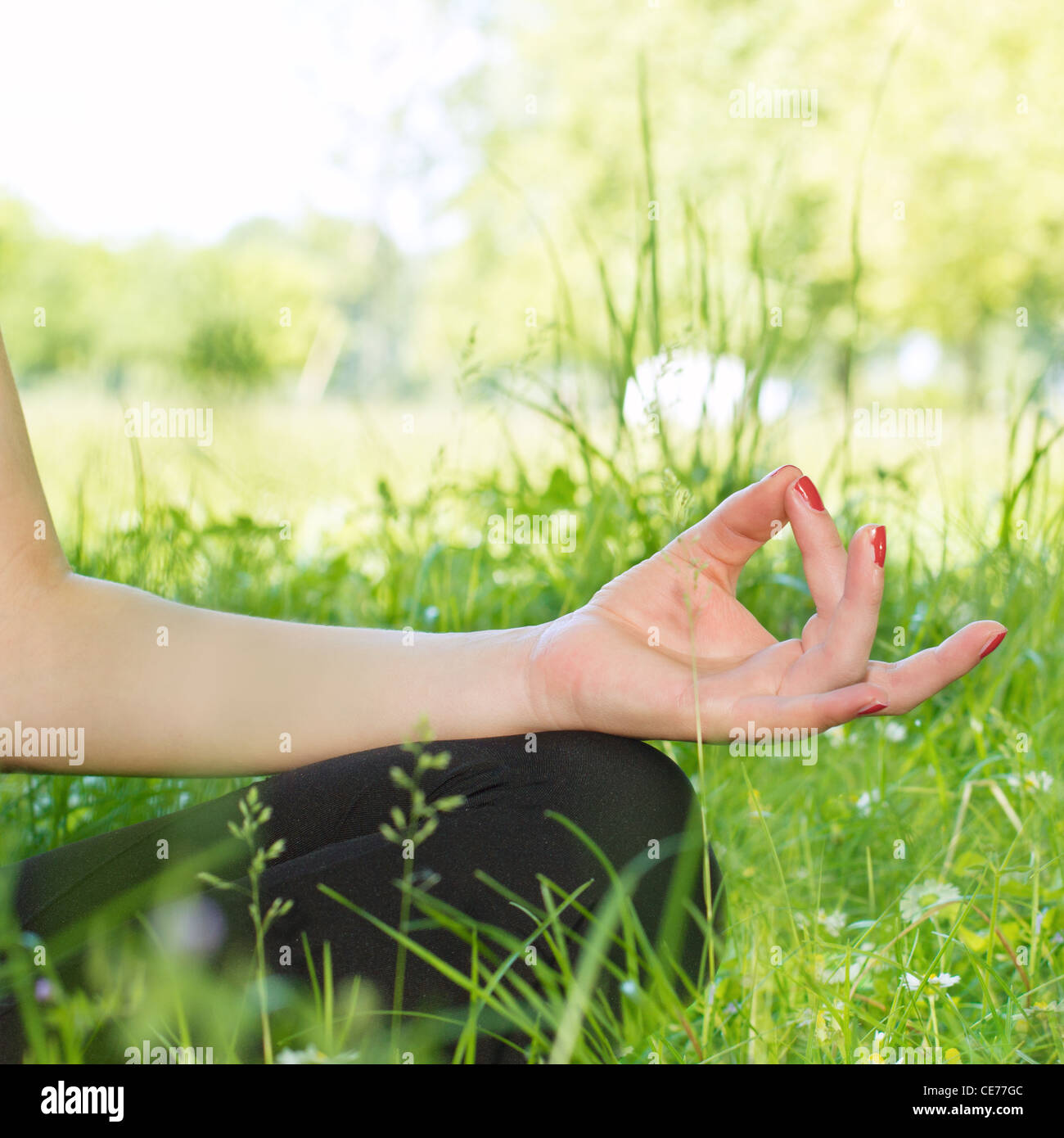 Close up of woman hand during meditation outdoors Stock Photo - Alamy