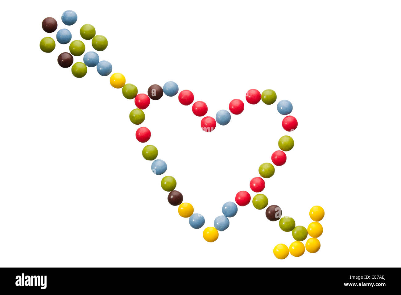 Heart made of colorful candy with arrow Stock Photo - Alamy