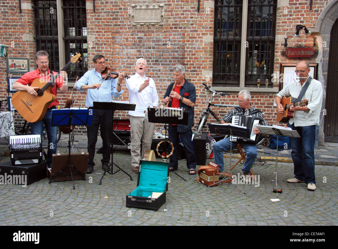folkloric traditional band in Bruges, Belgium Stock Photo - Alamy
