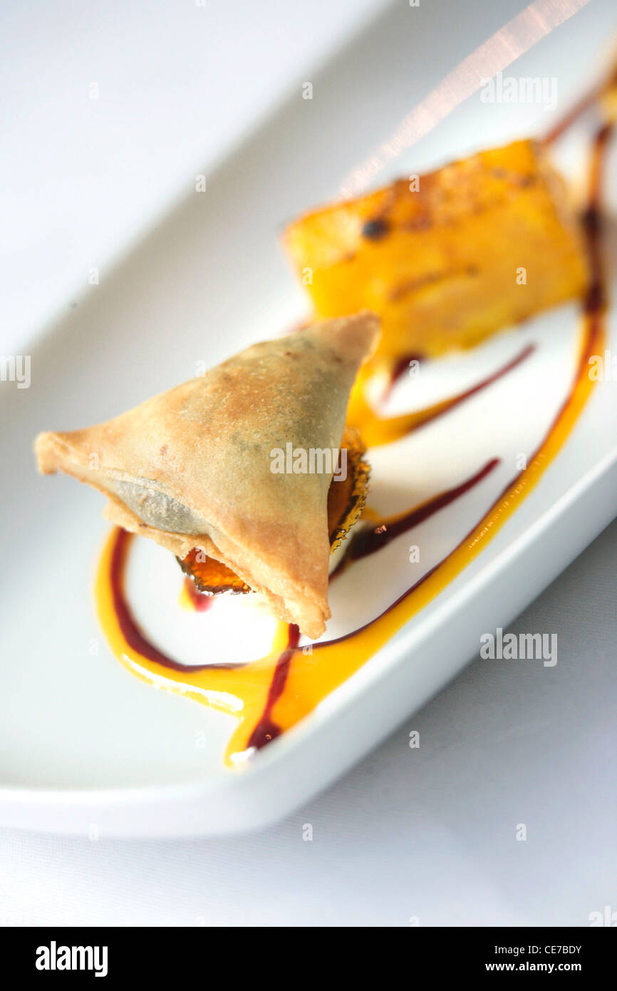 CHOCOLATE SAMOSA AND TANDOORI PINEAPPLE Stock Photo - Alamy