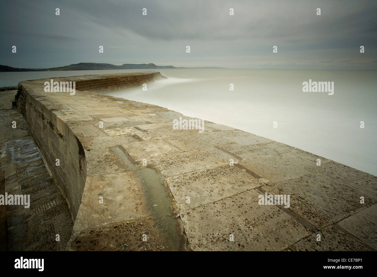 Rough seas around the old Cobb harbour wall around Lyme Regis harbour ...