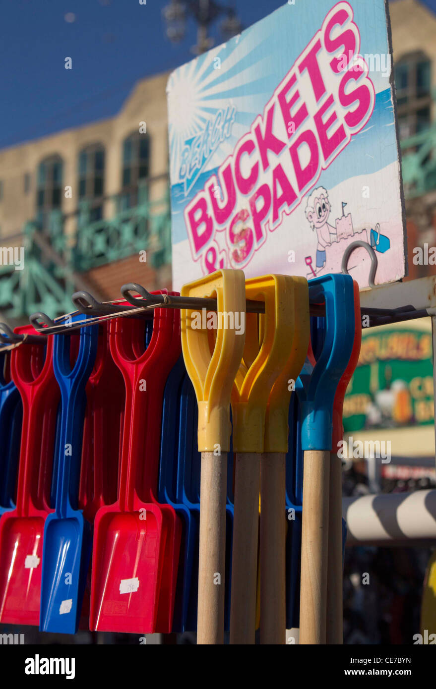 Bucket and spades outside shop in Brighton Stock Photo - Alamy