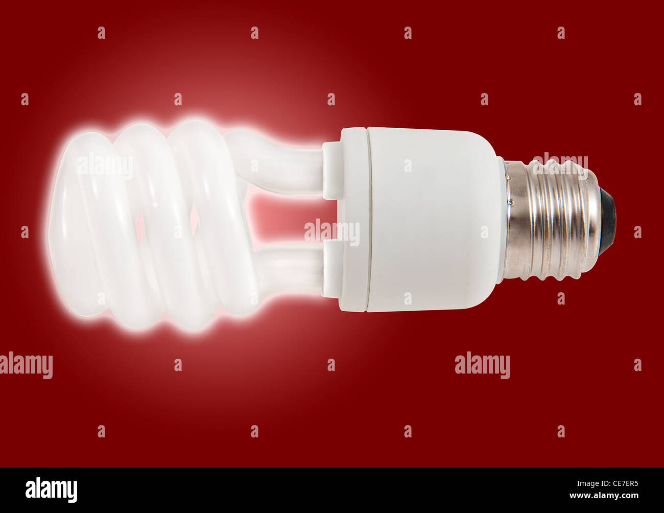 New style light bulb glowing on red Stock Photo - Alamy