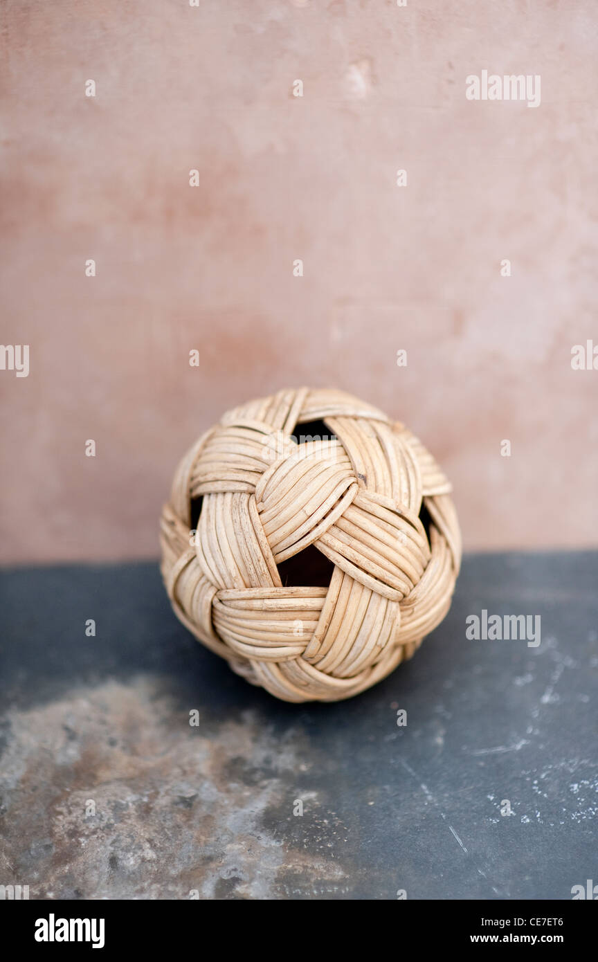 Woven ball of organic fibers on time worn surfaces Stock Photo - Alamy