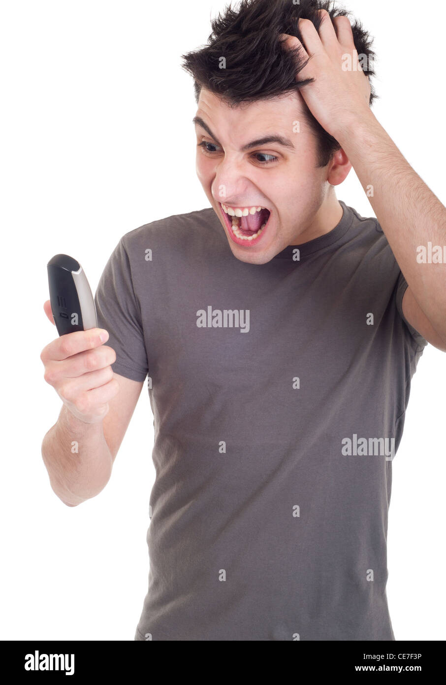 Man yelling into phone Stock Photo - Alamy