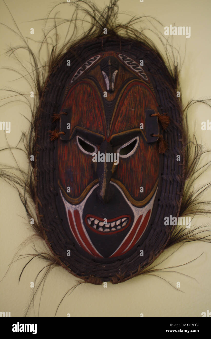 Polynesian Carved Painted Wooden Mask Stock Photo - Alamy
