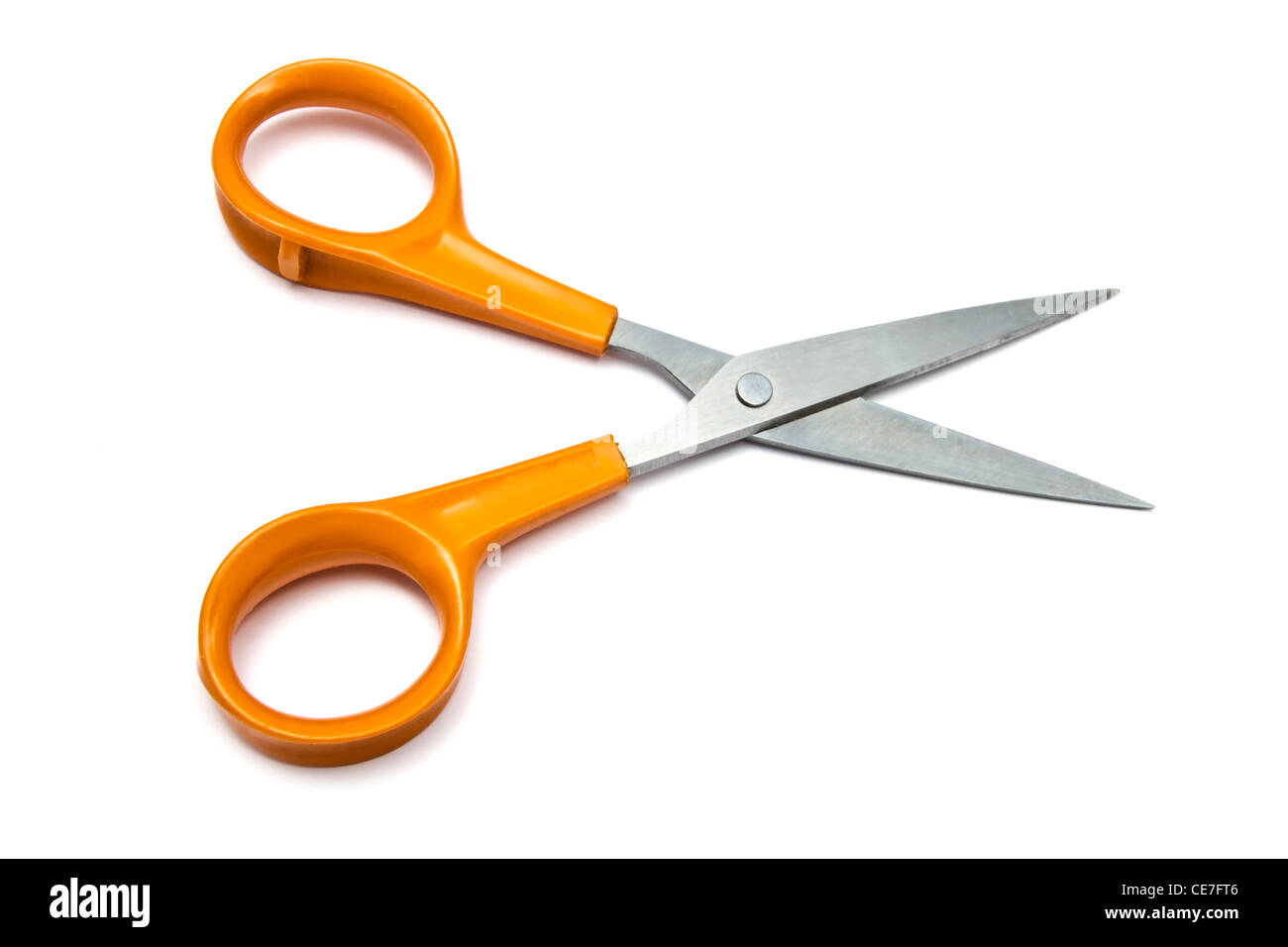 Yellow handled scissors isolated on white background Stock Photo - Alamy