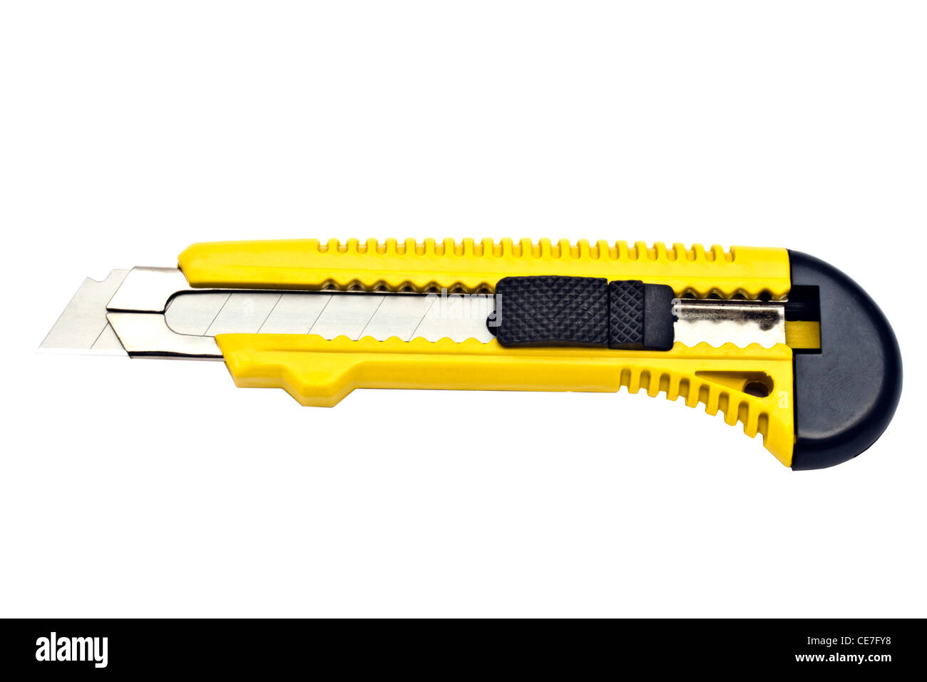 Yellow paper cutter isolated on white background Stock Photo - Alamy