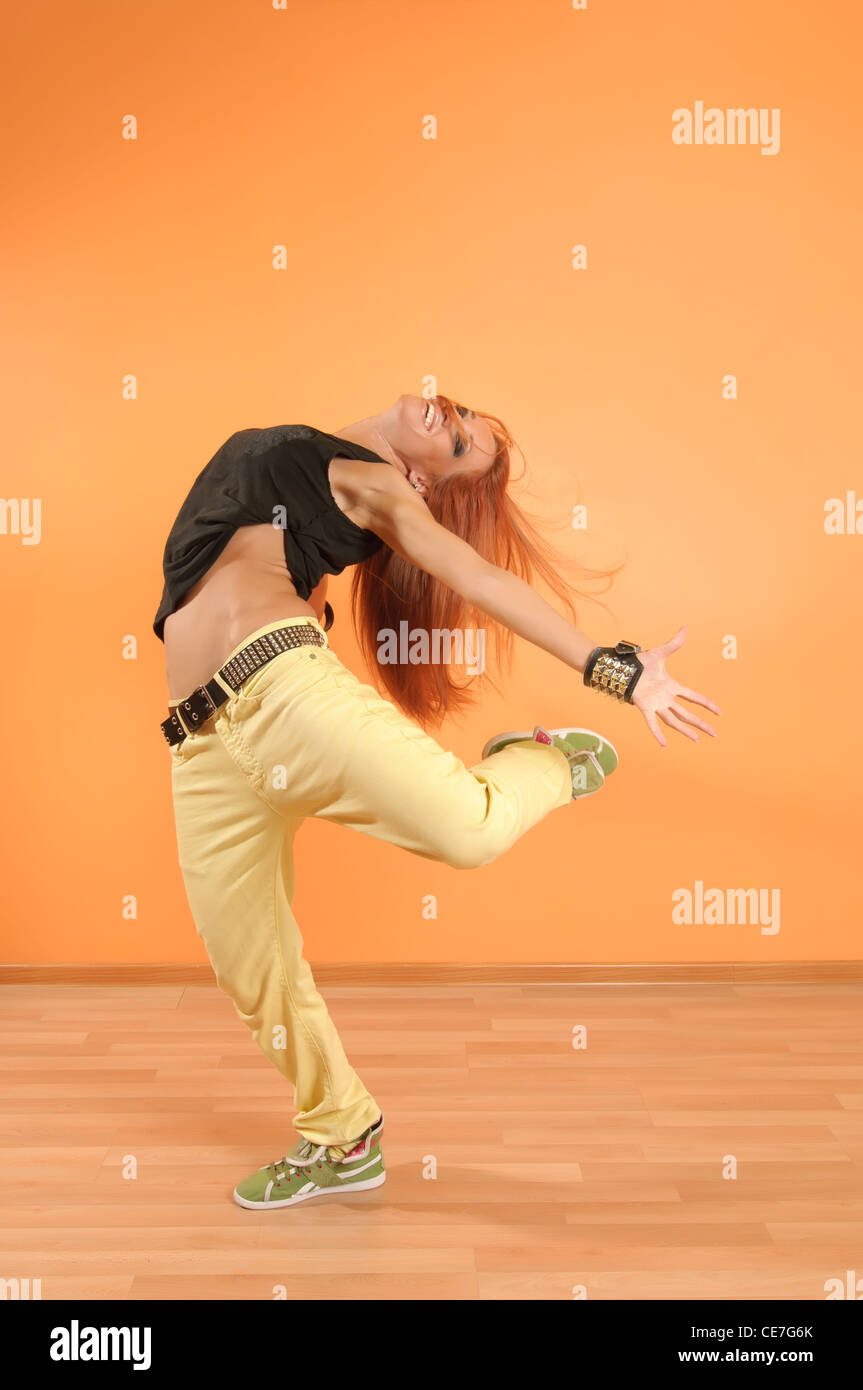 Modern dancer poses in front of the vivid background Stock Photo - Alamy