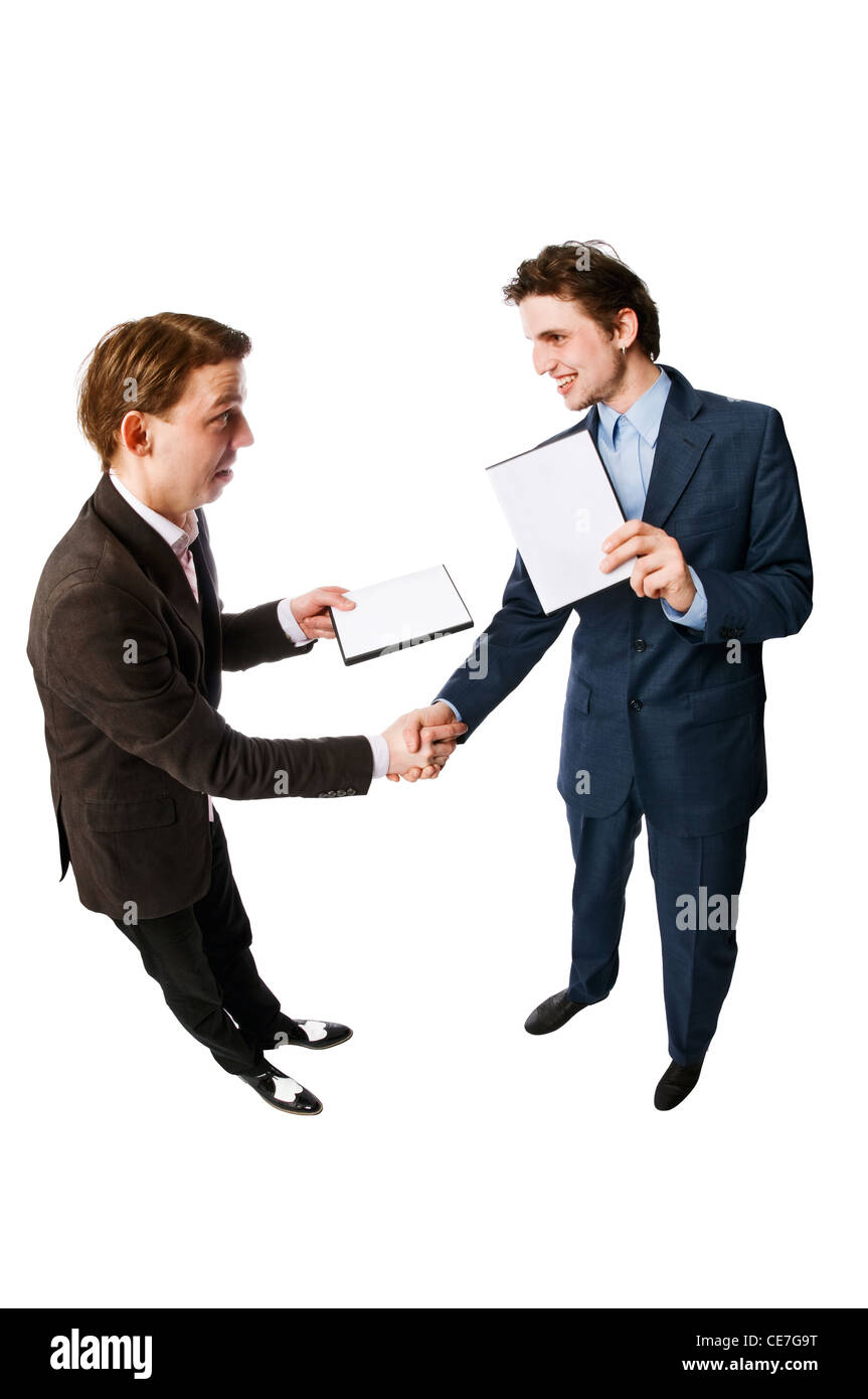 Two young people offering DVDs for sale on white background Stock Photo ...