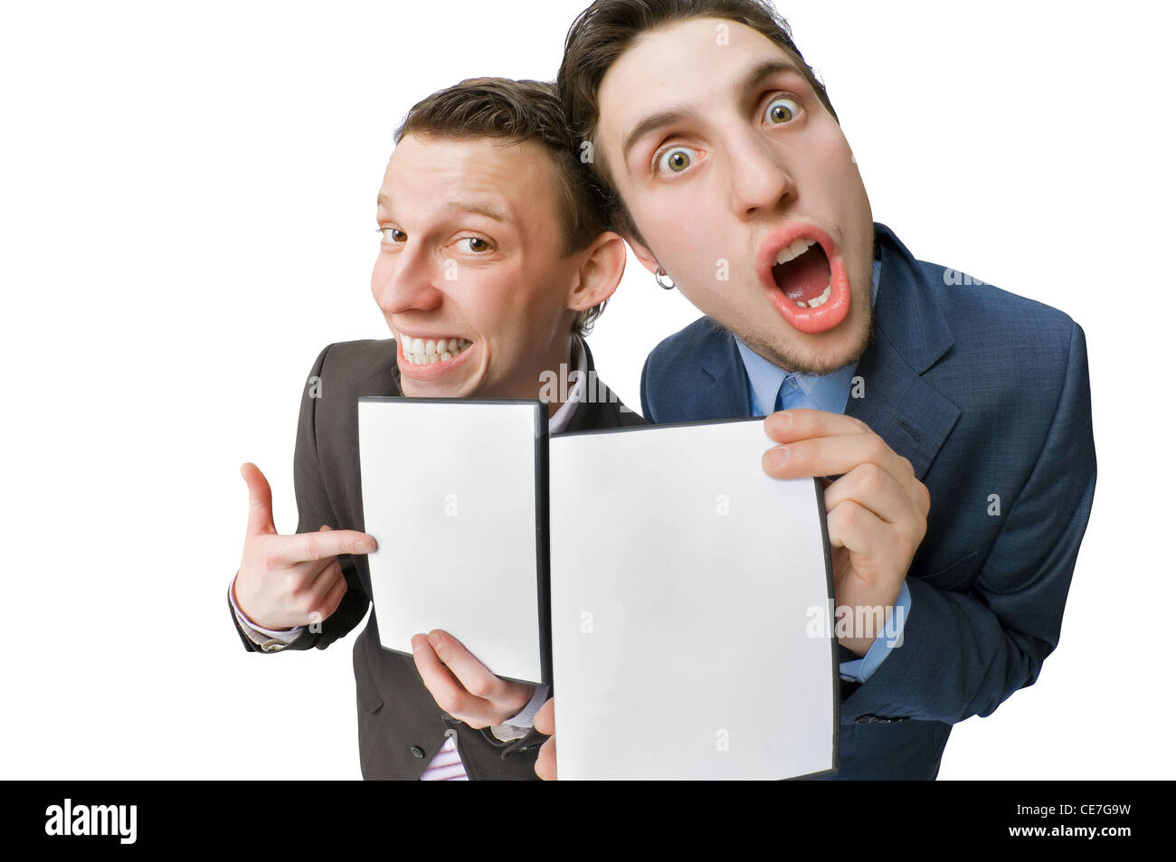 Two young people offering DVDs for sale on white background Stock Photo ...