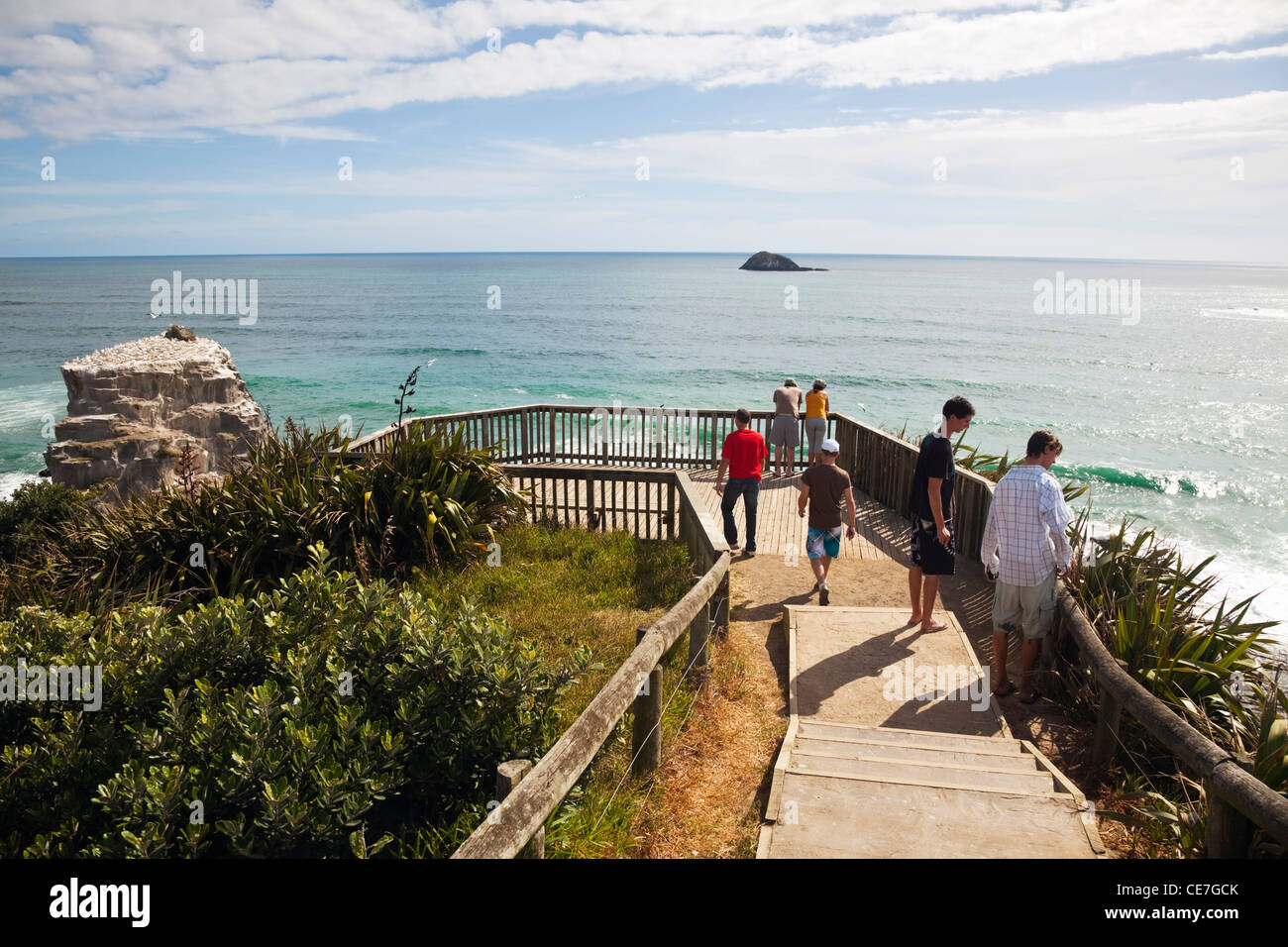 Visitors at the Otakamiro point lookout viewing the Takapu Refuge ...