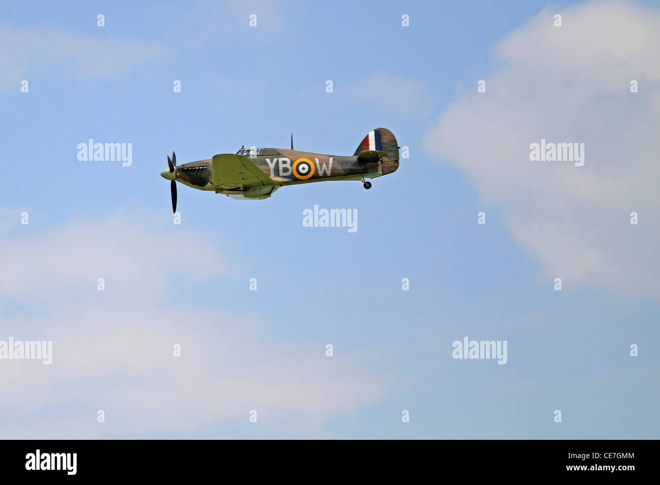 a spitfire flying passed at an airshow Stock Photo - Alamy