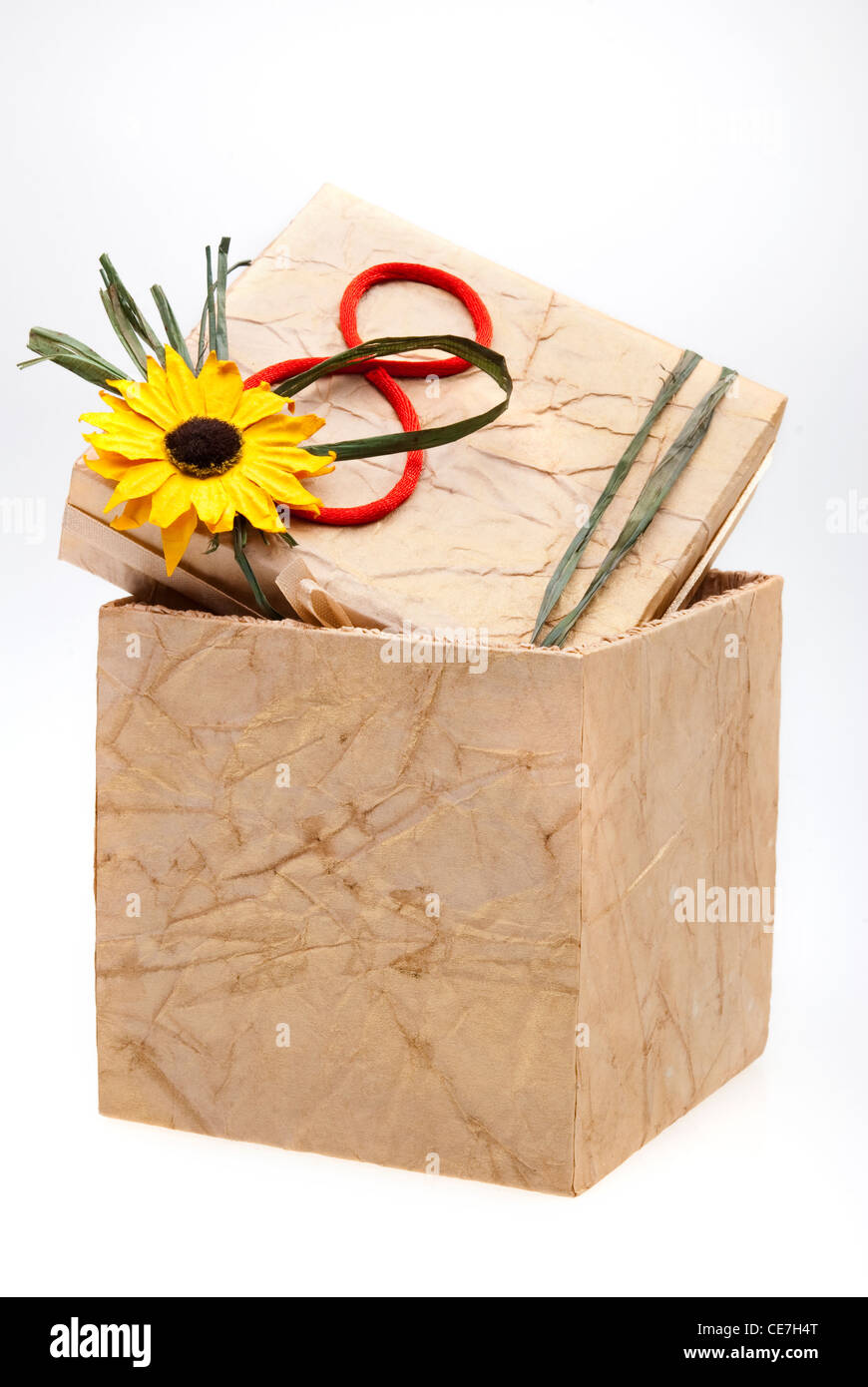 Gift Box decorated with ribbons and flower Stock Photo - Alamy