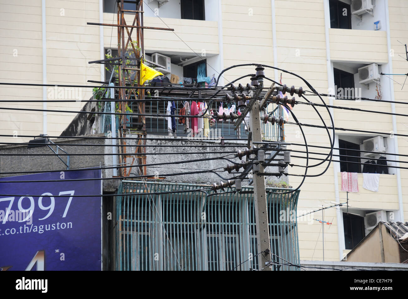 Telegraph wires, washing lines, jumble, overhead, apartments, flats ...