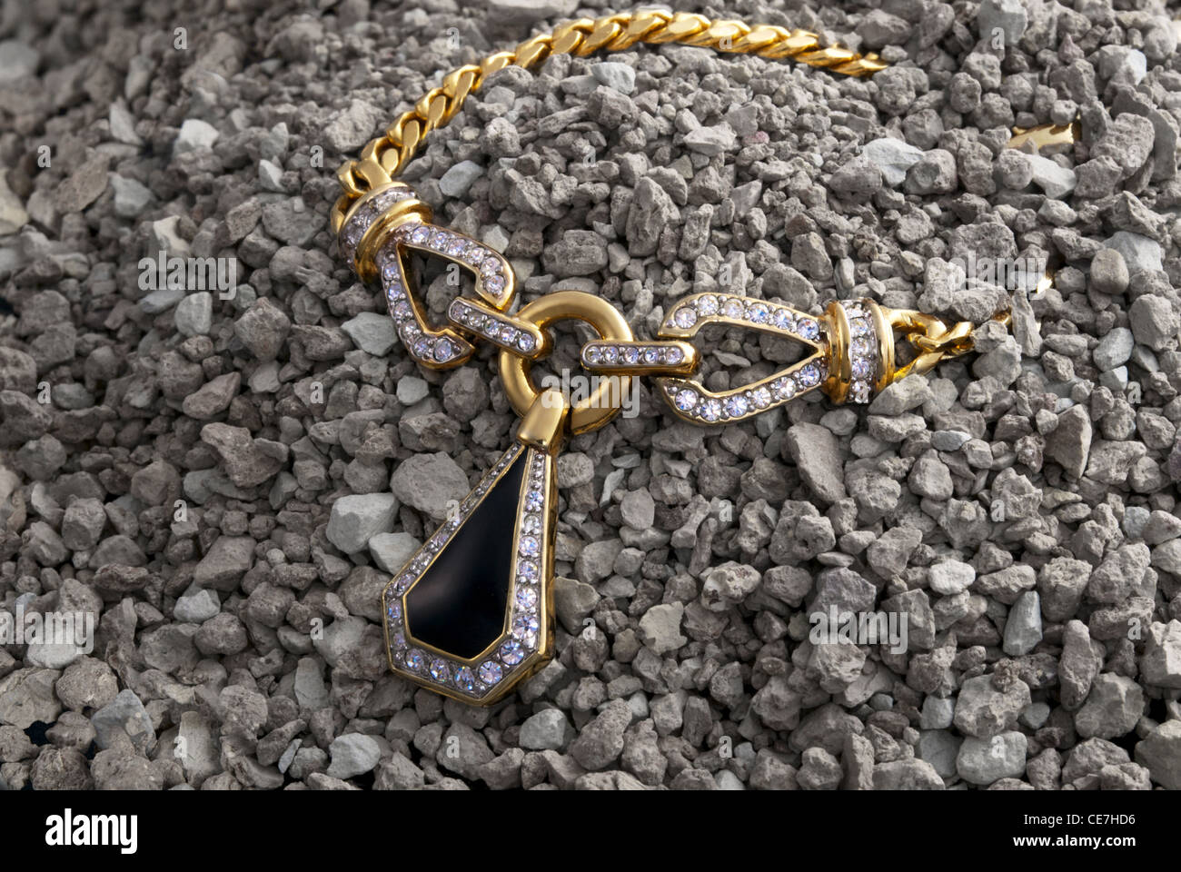 Gold pendent chain hi-res stock photography and images - Alamy