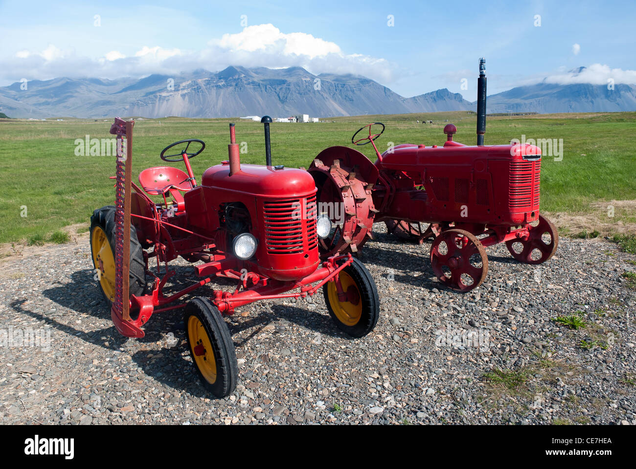 red tractors for agriculture in Iceland Stock Photo - Alamy