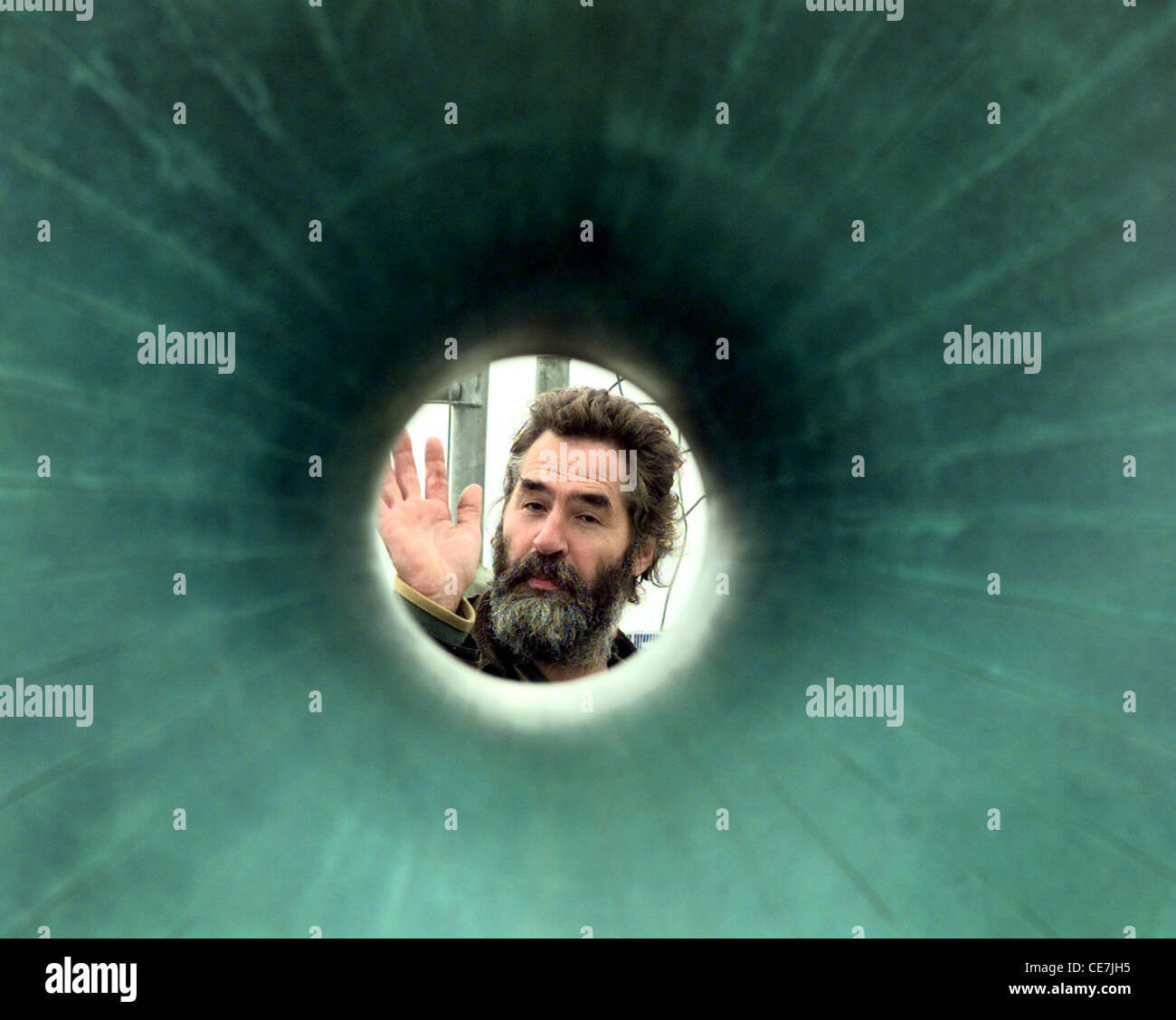 HAMISH BLACK IS FRAMED THROUGH HIS SCULPTURE Afloat AS IT IS POSITIONED ...