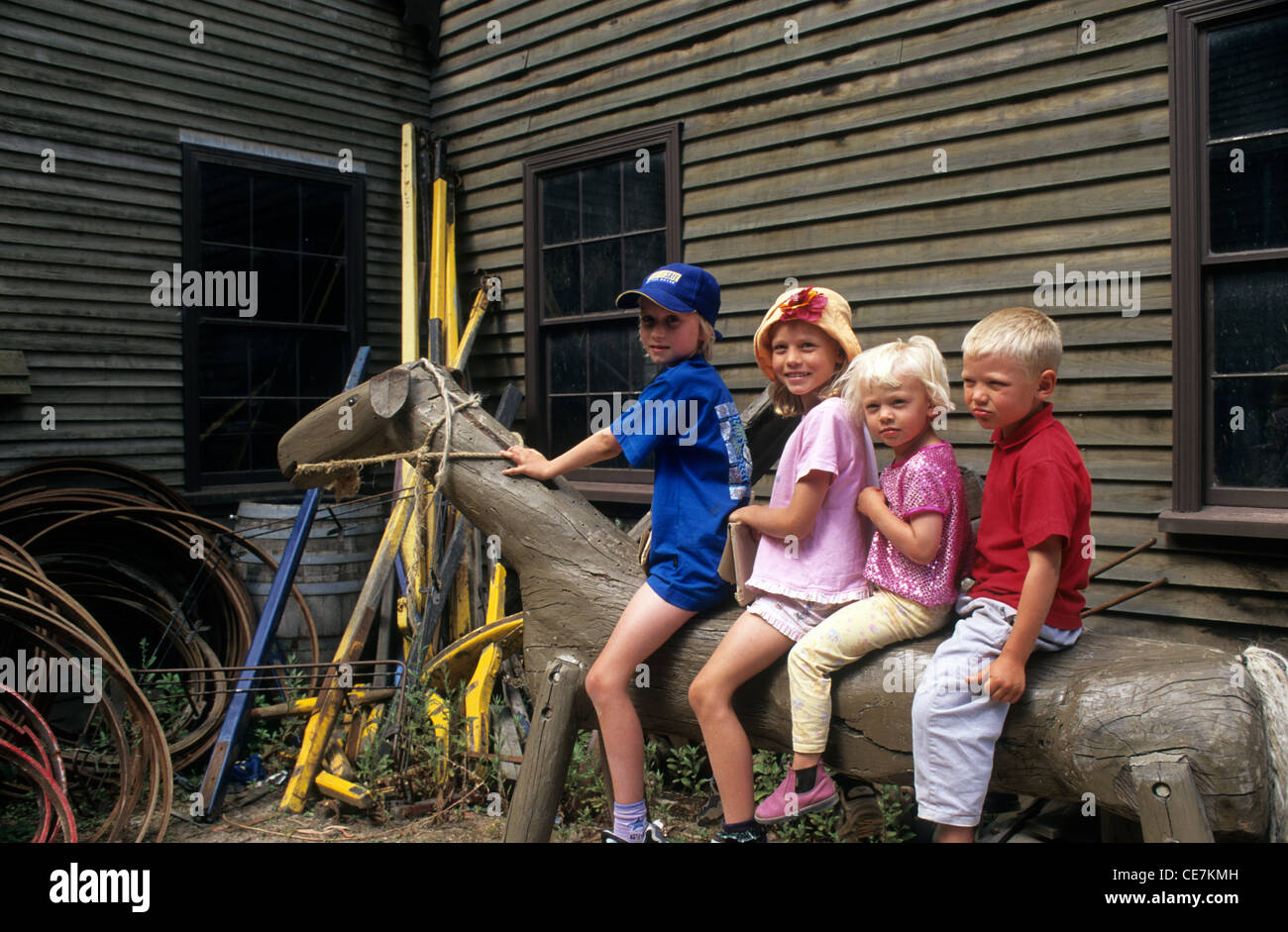 Five children sitting on a horse hi-res stock photography and images ...