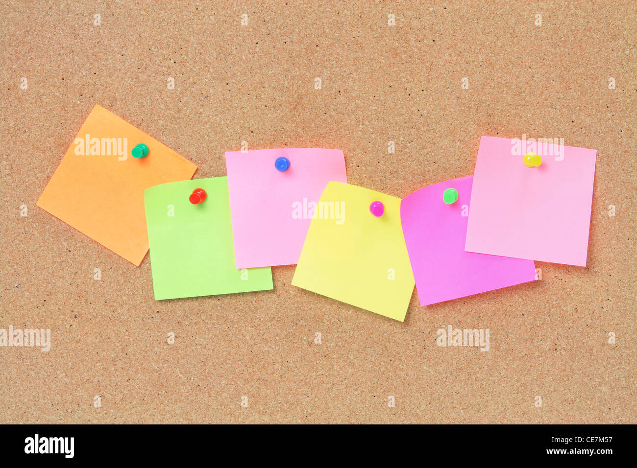 Adhesive Note Papers on Cork Board Stock Photo - Alamy