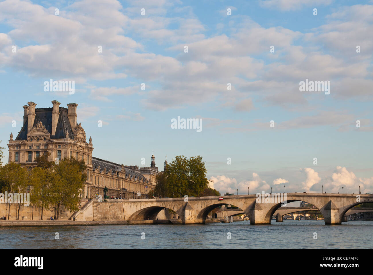A horizontal shot of the seine river in paris showing several bridges ...