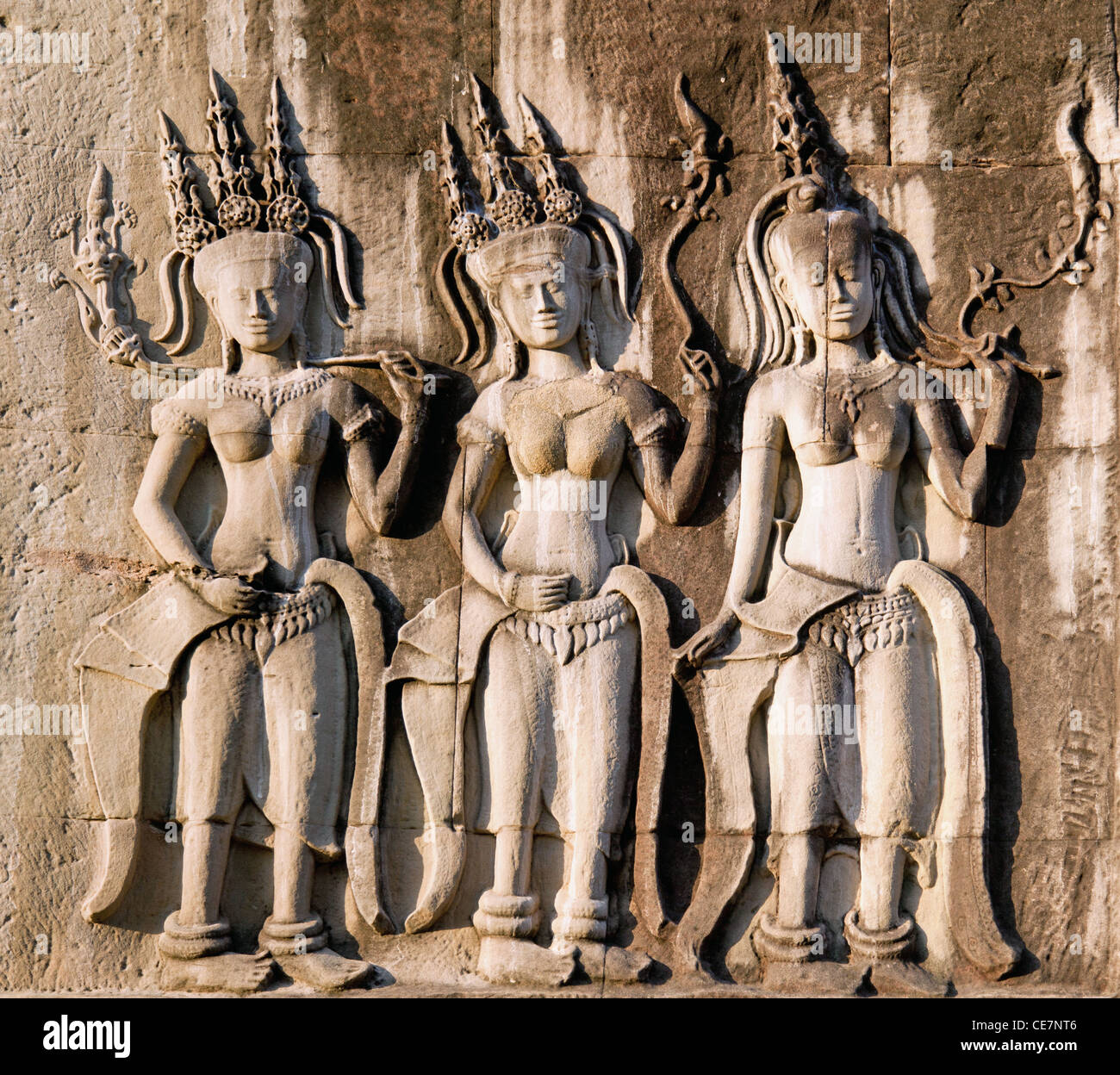 Three dancing apsara on the wall in Angkor Wat, Siem Reap, Cambodia Stock Photo - Alamy