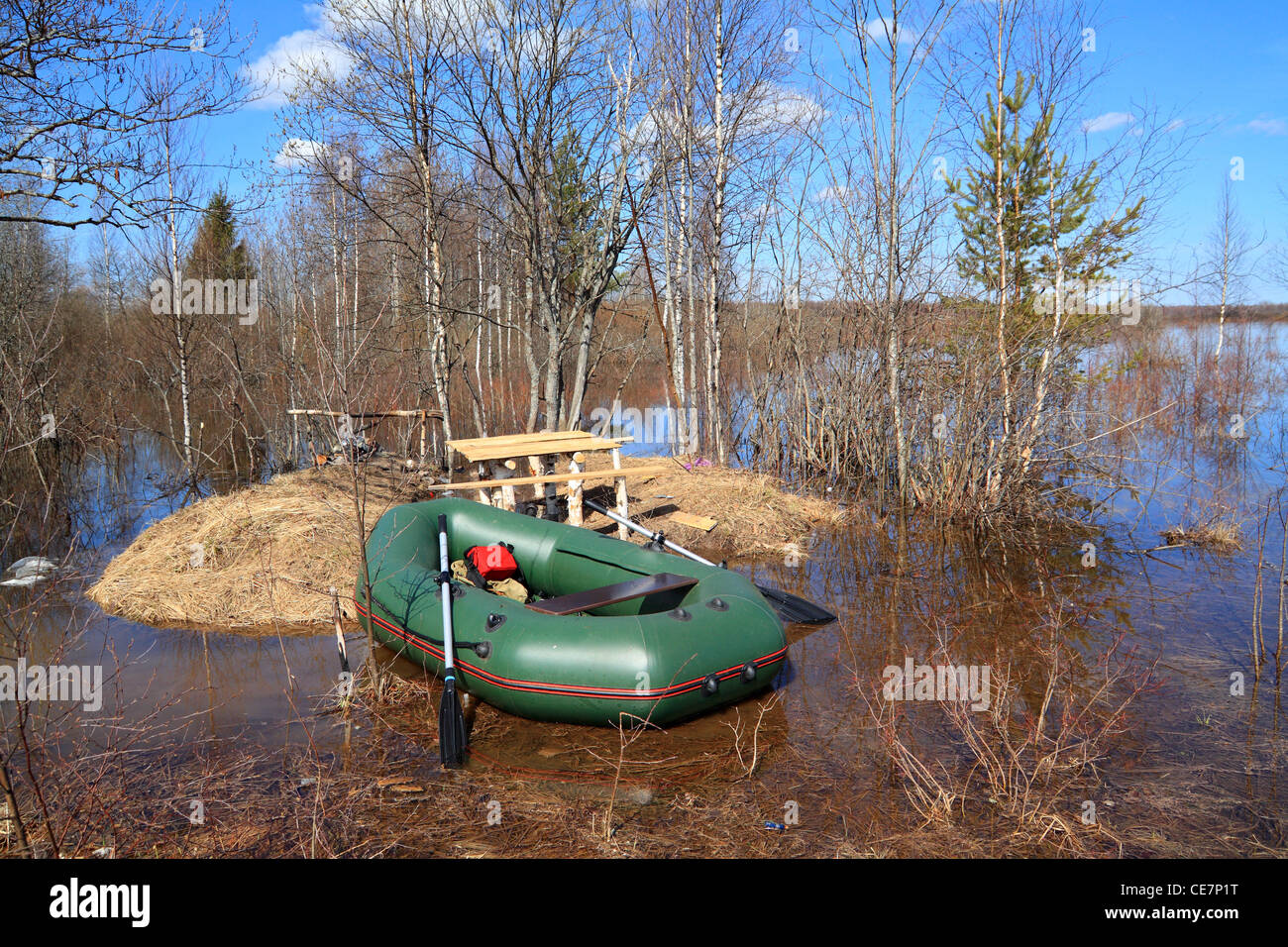 rubber boat on coast river Stock Photo - Alamy