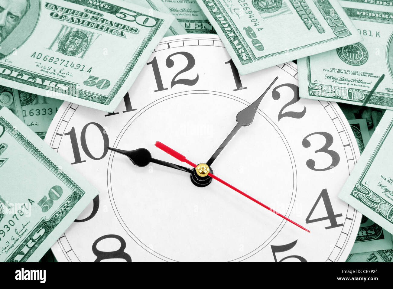 wall clock and dollars, concept of time is money Stock Photo - Alamy