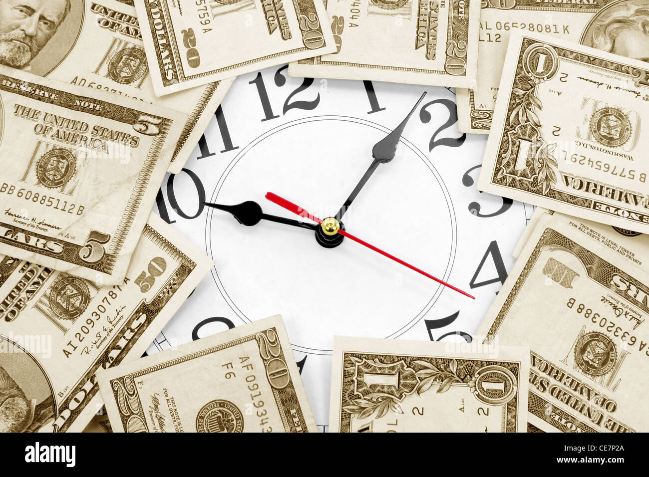 wall clock and dollars, concept of time is money Stock Photo - Alamy