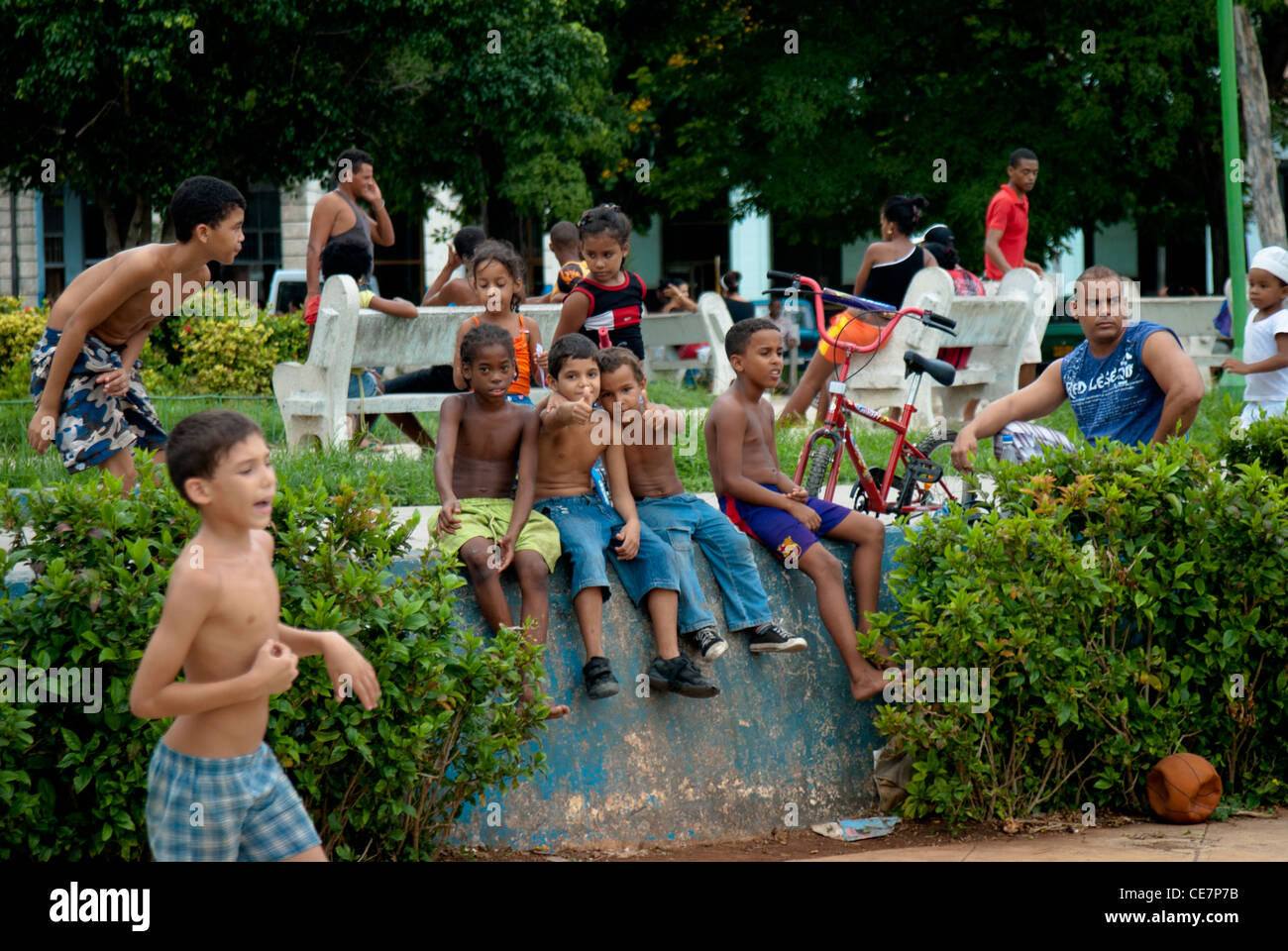 young Cuban boys in the playground, pointing at the camera Stock Photo ...