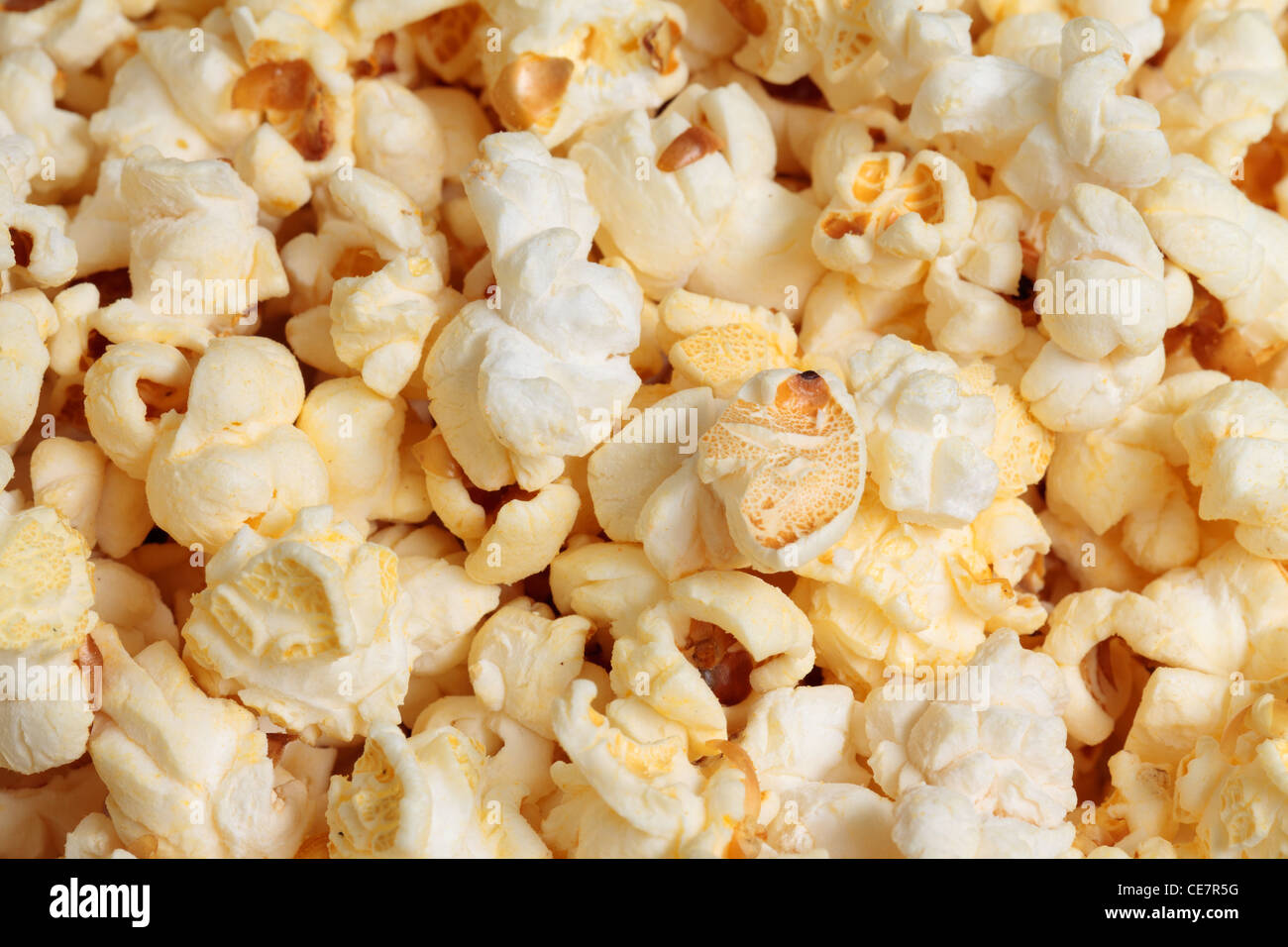 photo of yellow popcorn, closeup Stock Photo - Alamy