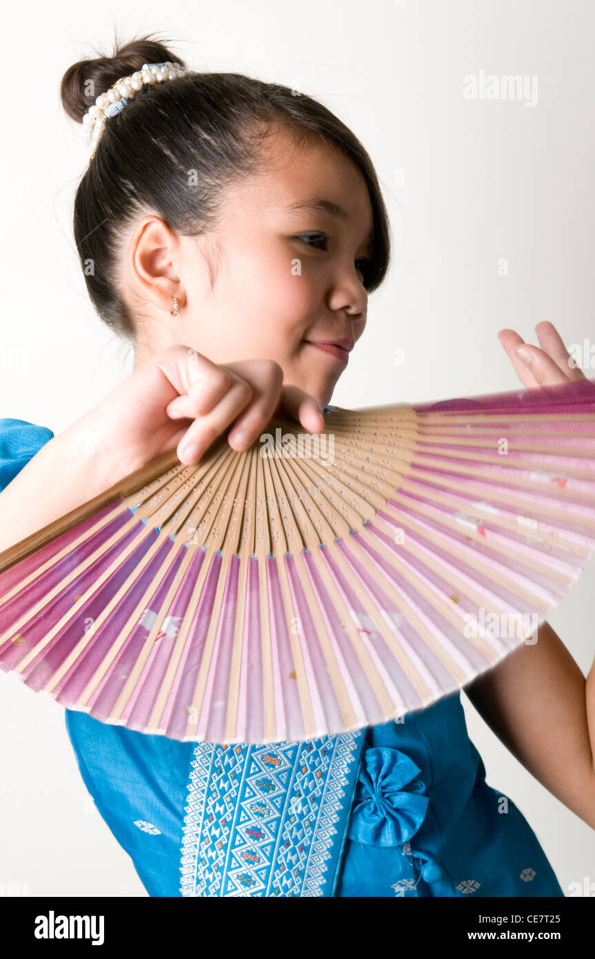 Asian Girl Dancing with Fan Stock Photo - Alamy