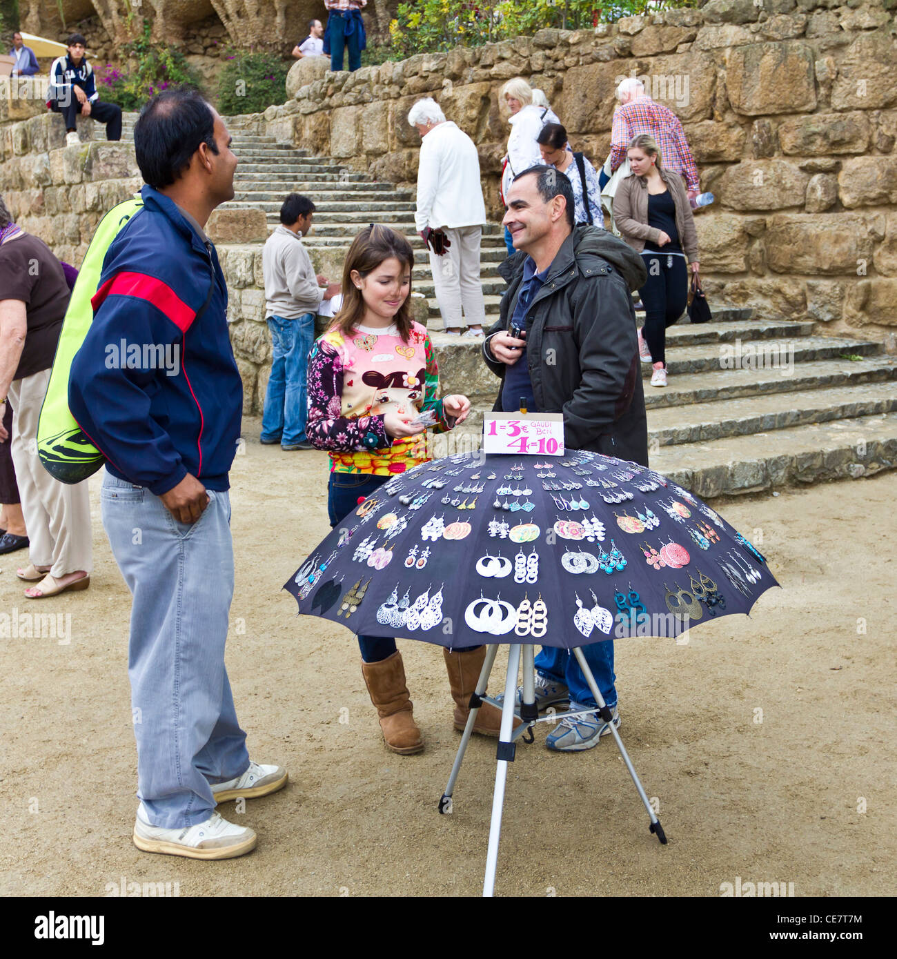 Tourists vendors at Park Guell garden complex in Barcelons, Spain ...