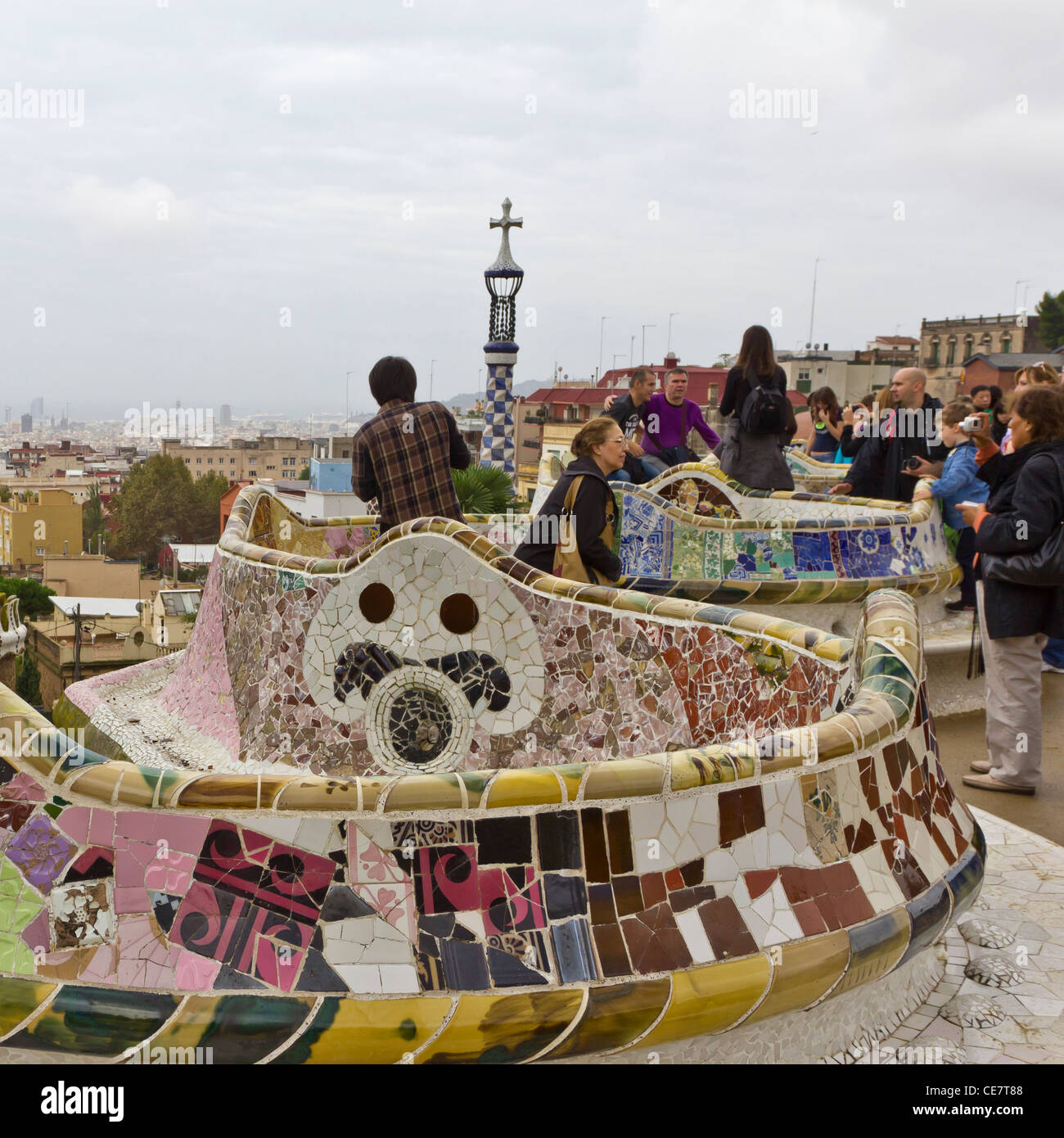 Tourists visiting Park Guell garden complex in Barcelons, Spain ...